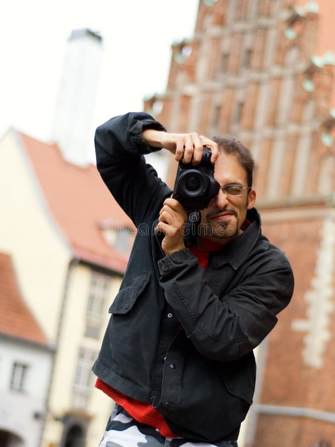 Guy with a digital camera stock image. Image of camera - 3357783