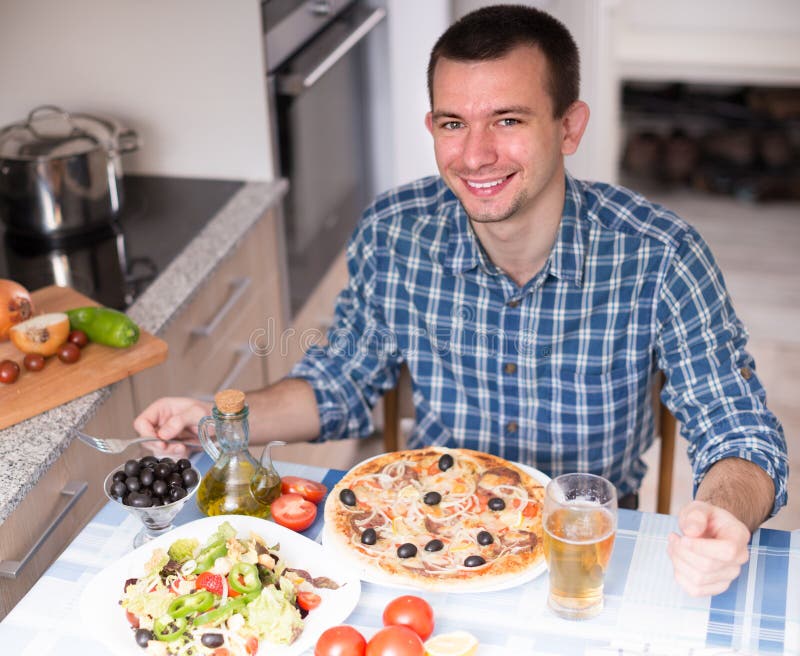 Man Dinner Pizza Salad in the Kitchen at Home Stock Photo - Image of ...