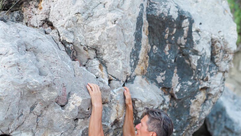 Guy Doing Pull Ups on Rock Outdoors. Stock Footage - Video of exercises ...