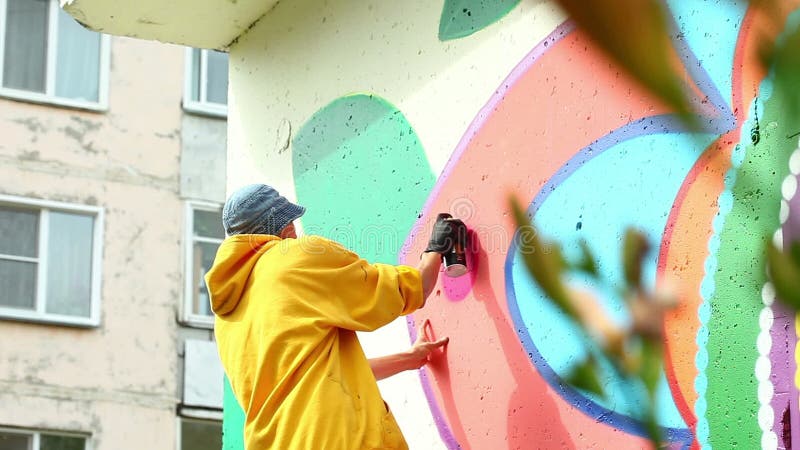 Guy Drawing with Paint from Spray on Wall Stock Footage - Video of ...