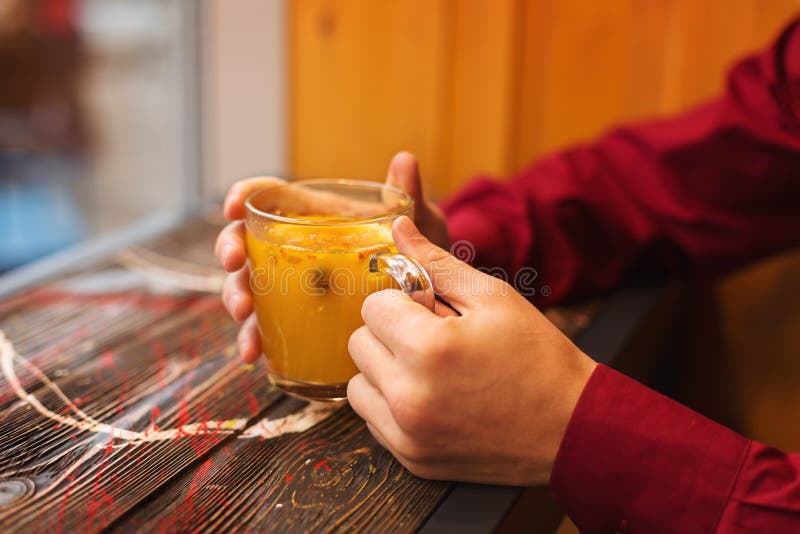 Guy Drinks Tea in Cafe in Fall Stock Photo - Image of city, face: 120521364