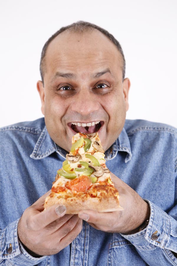 Guy eating pizza slice stock image. Image of crispy, cheese - 12749187