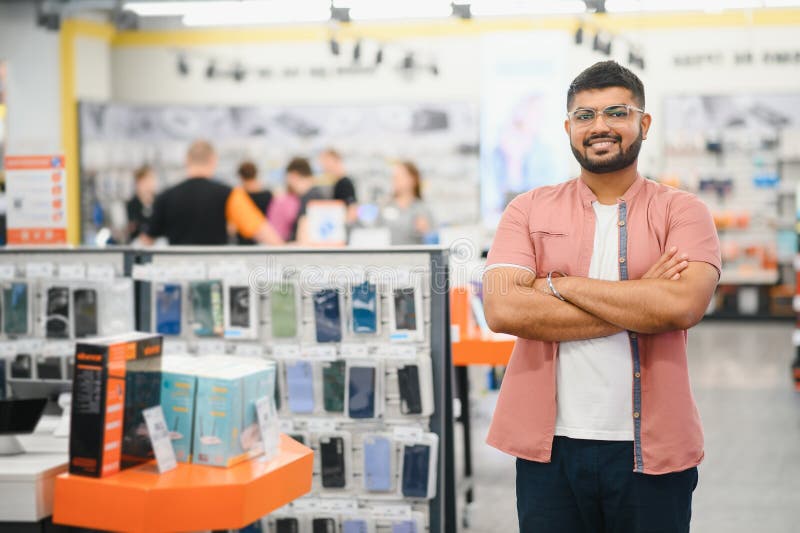 Indian Man in an Electronics Store Stock Image - Image of mall, digital ...