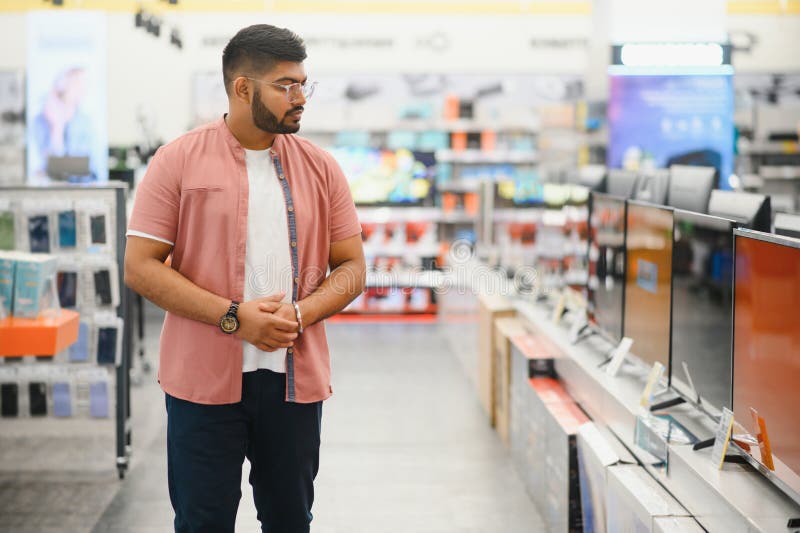 Indian Man in an Electronics Store Stock Image - Image of computer ...