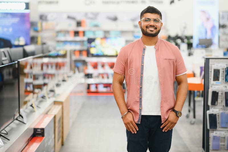 Indian Man in an Electronics Store Stock Image - Image of tech ...