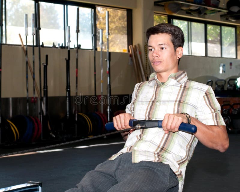 Guy exercising in a gym stock photo. Image of move, indoor - 11234472