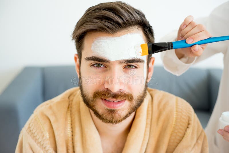 Guy with a facial mask stock image. Image of horizontal - 95209341