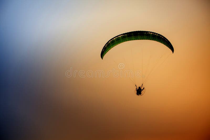 Guy Flying on the Coloful Sky by Paramotor Kite,extreme Activity Port ...