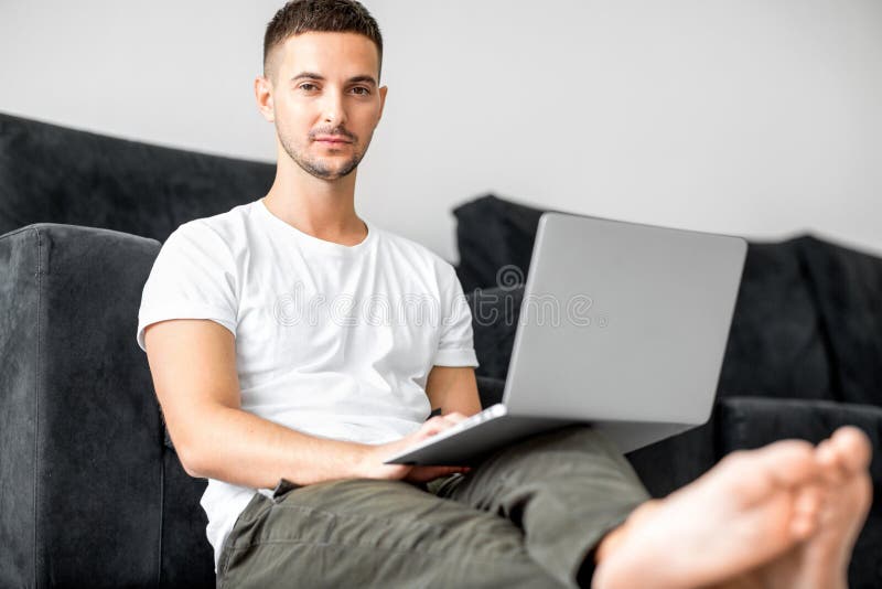 Guy Freelancer with Laptop Working at Home Stock Image - Image of ...