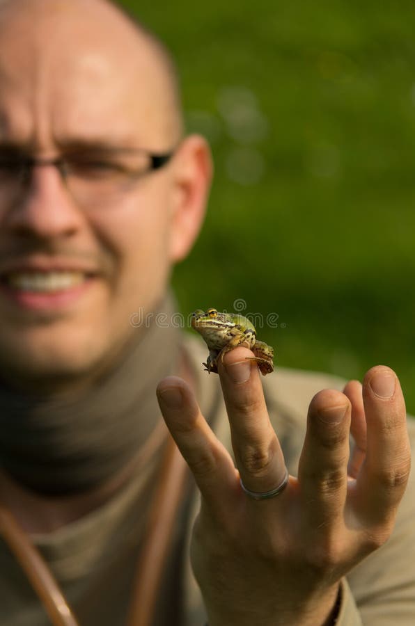 Guy with frog stock image. Image of frog, finger, animal - 44456343