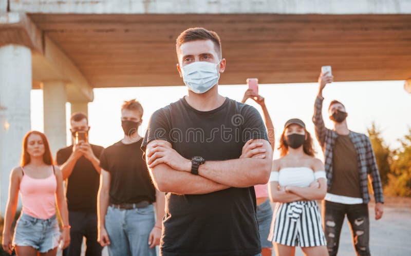 Guy at the Front of Crowd. Group of Protesting Young People that ...