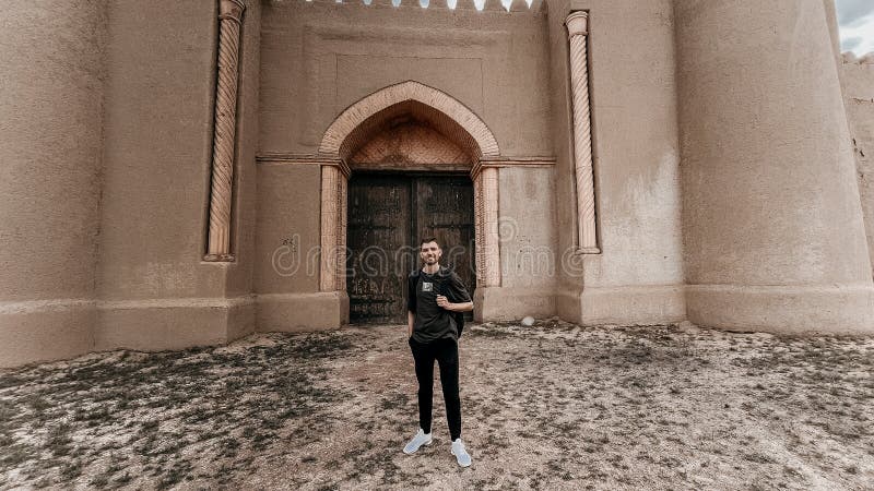 The Guy at the Gate of the Castle Stock Photo - Image of tower, person ...