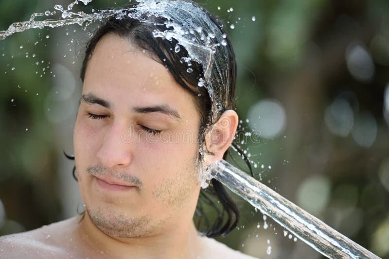 Guy getting splashed stock photo. Image of handsome, lifestyle - 69443402