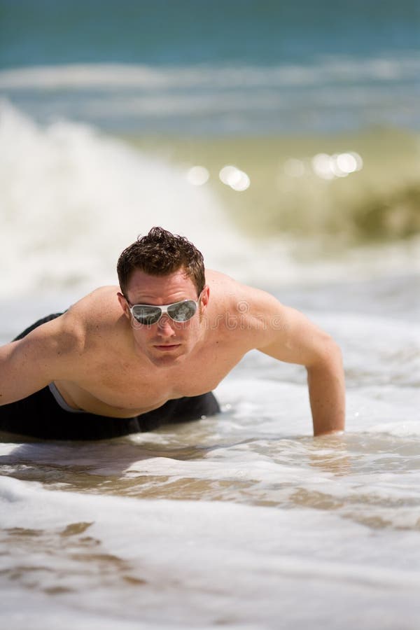 Hunk at the Beach with Shades Stock Photo - Image of demure, toothy ...