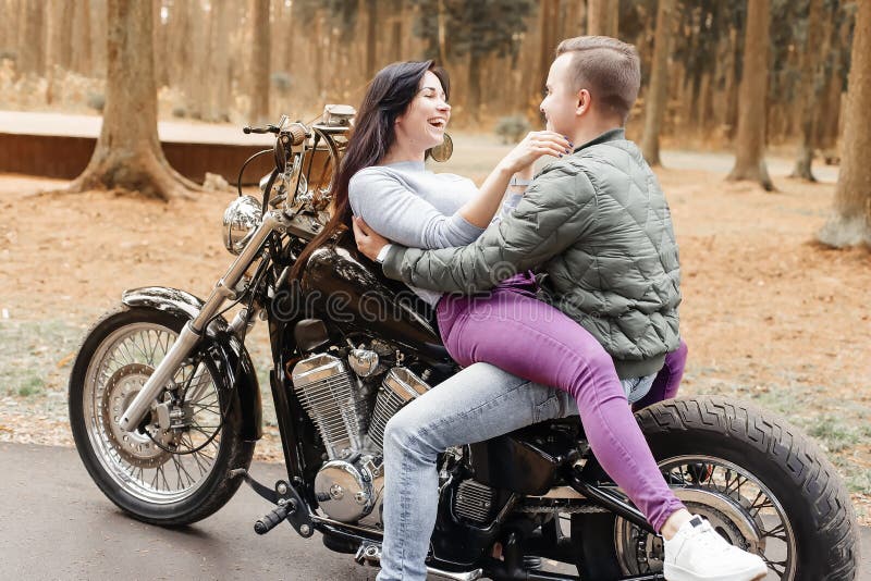 Guy with a Girl in the Park on a Motorcycle Stock Photo - Image of park ...