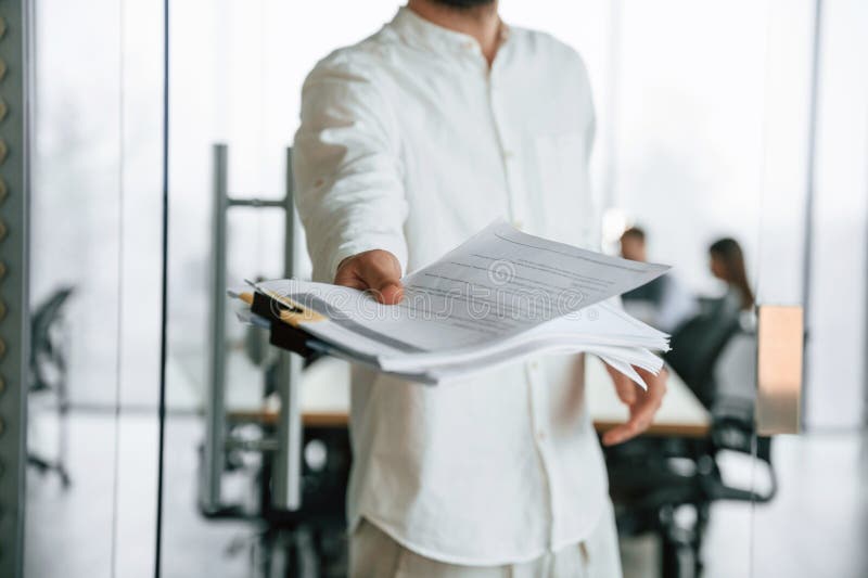 Guy is Giving the Documents. Team of Office Workers are Together ...