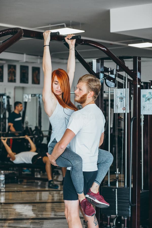 Guy Hepl Girlfriend on Training in Gym Stock Image - Image of female ...