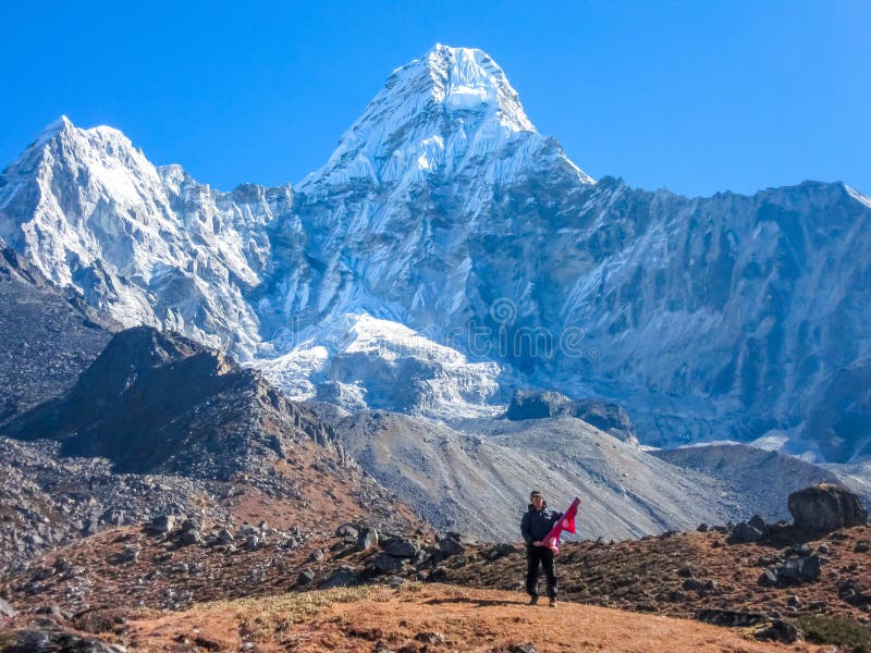 Guy Holding National Flag of Nepal Against Himalaya Mountain Peak ... Guy Holding National Flag of Nepal Against Himalaya Mountain Peak ...