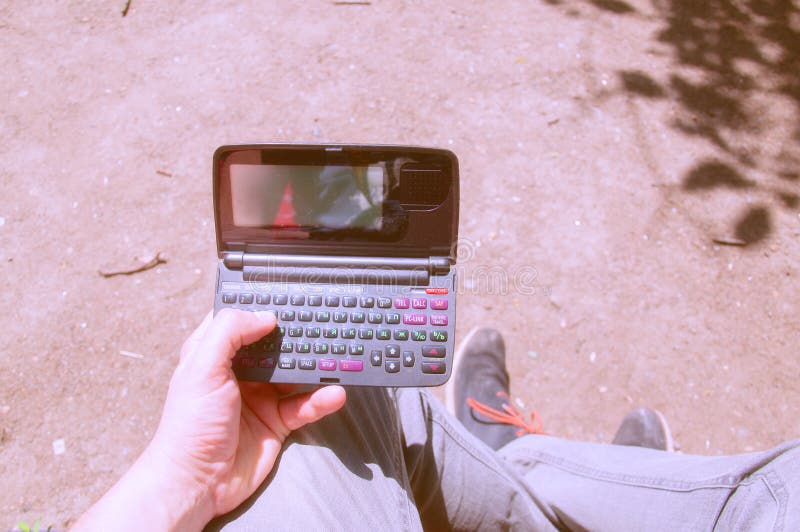 The Guy is Holding an Old Microcomputer. the Obsolete Device Stock ...