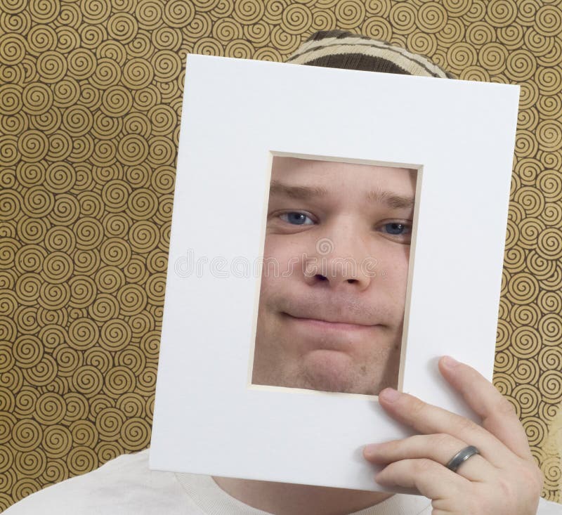 Guy Holding Picture Frame stock photo. Image of male, striped - 7686172