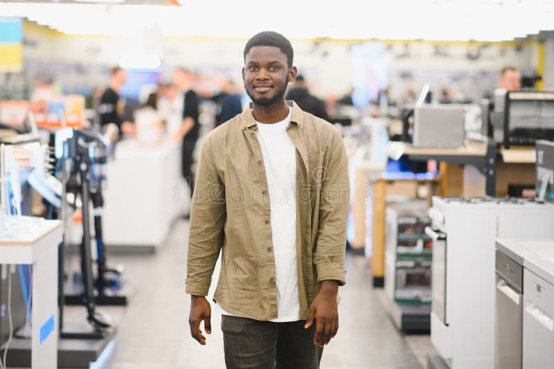 Guy at a Home Appliances Store Stock Image - Image of household ...
