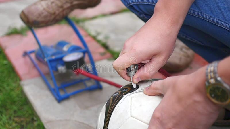 The guy inflate the ball stock footage. Video of balloon - 77258854