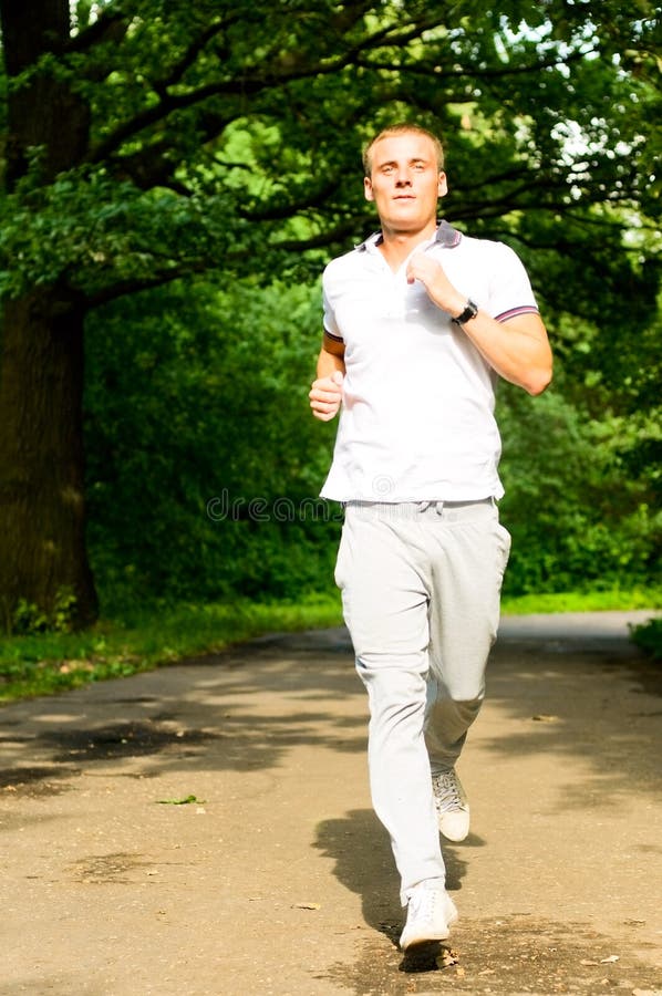 Guy jogging stock image. Image of runner, close, practise - 15733405
