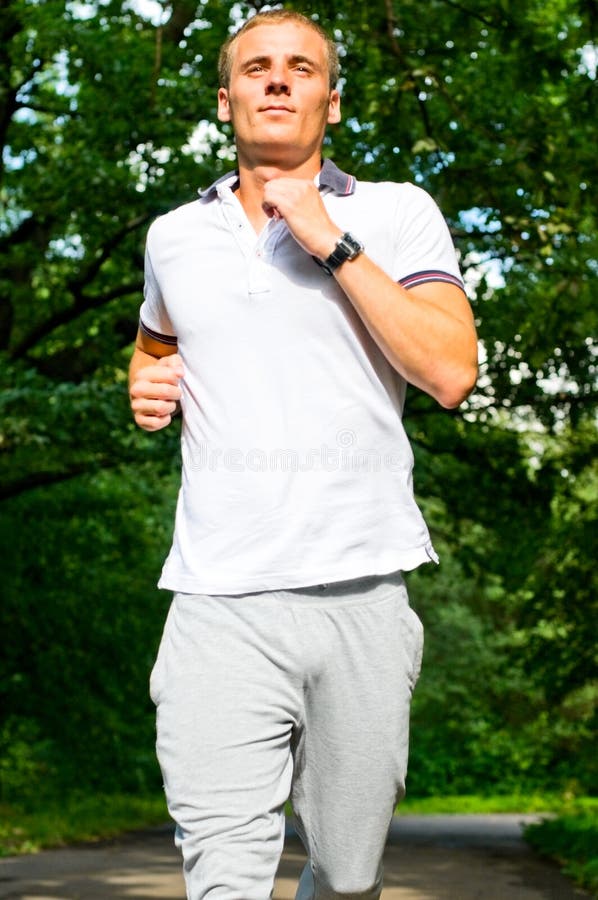 Guy jogging stock image. Image of runner, close, practise - 15733405