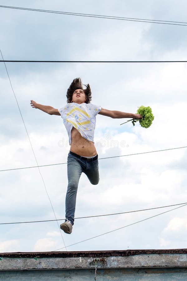 The Guy is Jumping from the Roof Stock Image - Image of outdoor ...