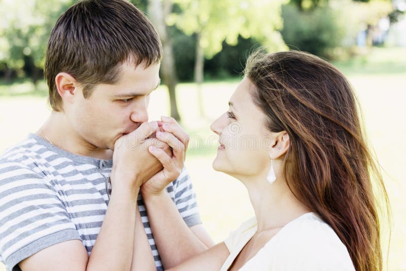 Guy Kissing Girfriends Hands Stock Photo - Image of person, hands: 10703102