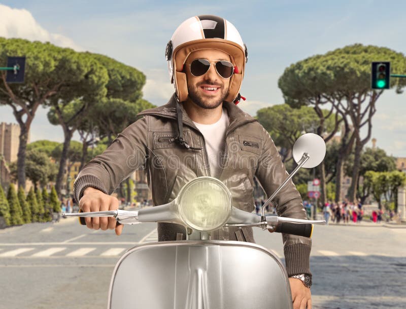 Guy in a Leather Jacket Sitting on a Scooter on the Streets of Rome ...
