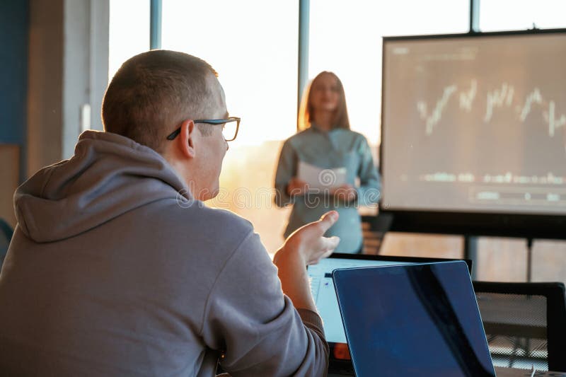 Guy is Listening. Female Business Trainer is Against Projector with ...