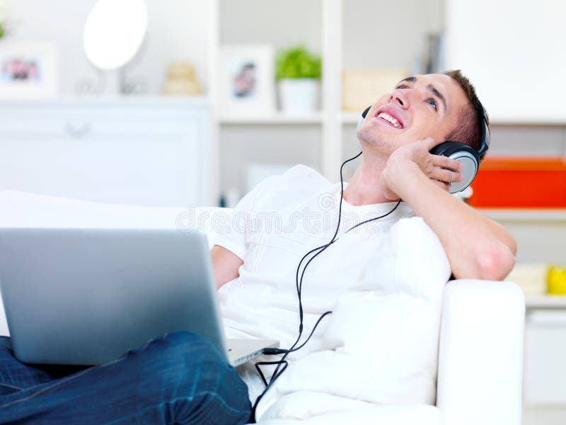 Man with Laptop and Headphone Stock Image - Image of leisure, computer ...