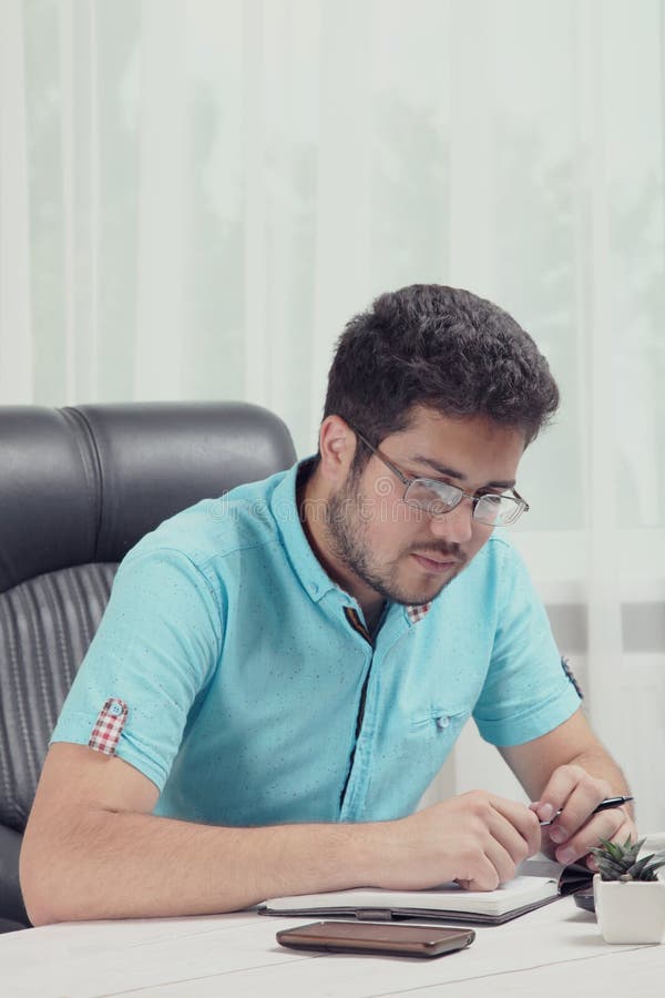 Guy is Looking at the Notebook Stock Photo - Image of sight ...