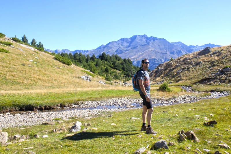 Guy Looking To the High of a Mountain Stock Image - Image of walker ...