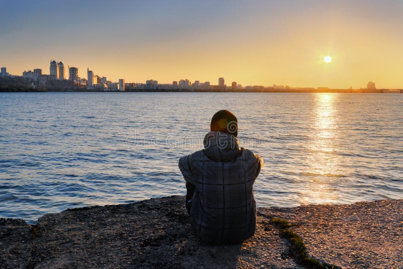 Guy Meets Sunset Siting River Bank Stock Photos - Free & Royalty-Free ...