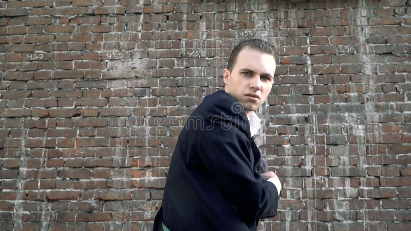 The Guy with a Menacing Look Waving His Hat in Slow Motion Stock ...