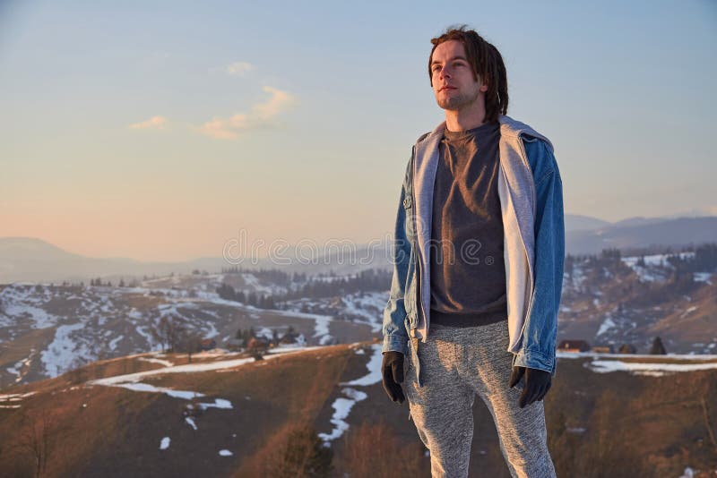 Guy Model Hipster in Jeans Standing Posing on a Mountain Landscape at ...
