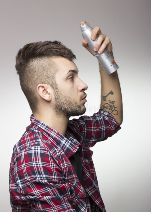 Guy Mohawk Putting Hairspray Stock Photos - Free & Royalty-Free Stock ...