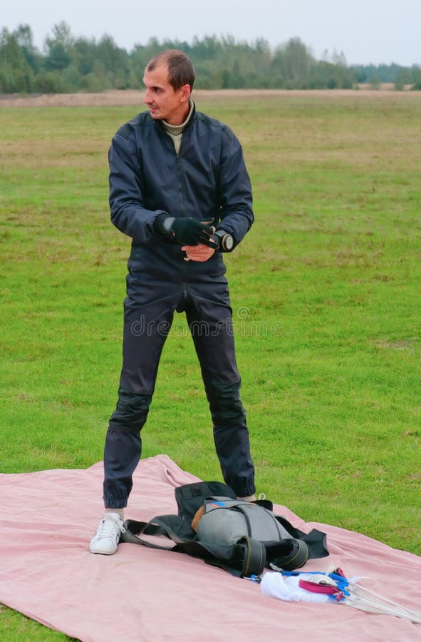 The Guy-parachutist in Black Overalls Stock Photo - Image of rescue ...