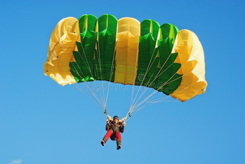 The Guy Parachutist in Red Overalls Stock Photo - Image of bright ...