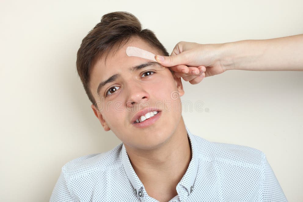Guy with a Plaster on His Forehead Stock Image - Image of human ...