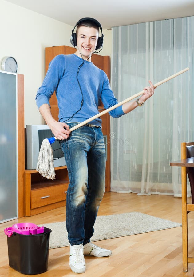 Guy Playing and Cleaning in Room Stock Photo - Image of dreams ...