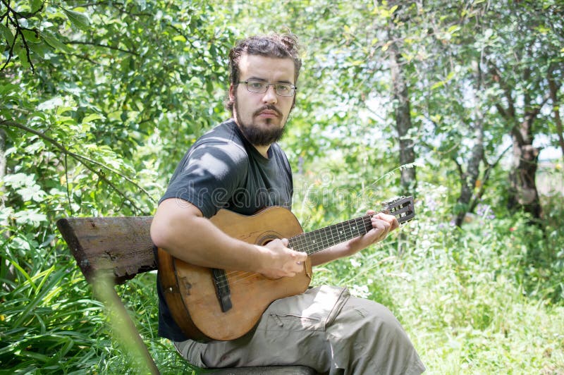 Guy playing guitar stock photo. Image of park, guitarist - 57040642