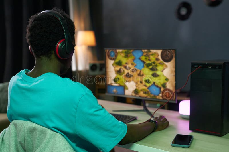 Guy Playing Video Game on Computer Stock Image - Image of neon ...