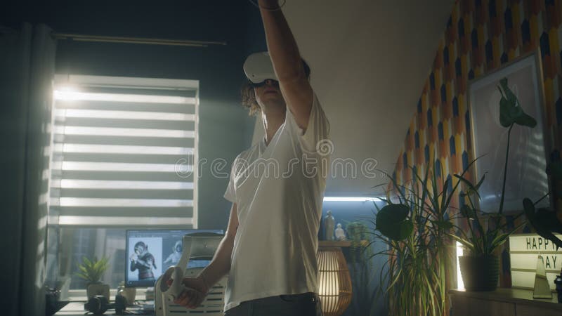 Guy Playing Video Game in VR Headset Stock Image - Image of controllers ...