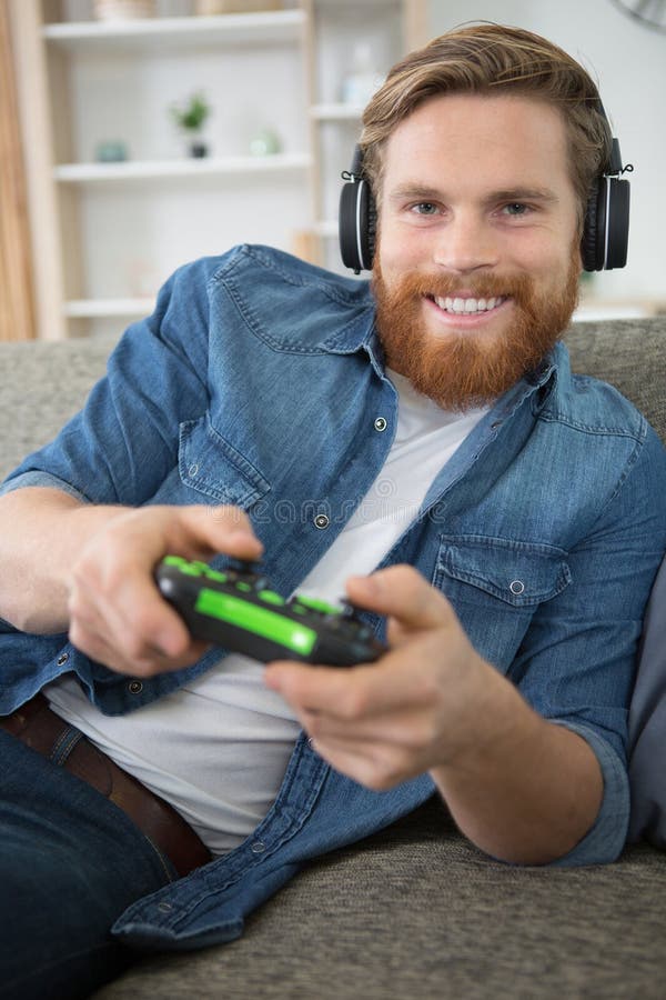 Guy Playing Video Games at Home Stock Photo - Image of tutorial, lecture: 308148312