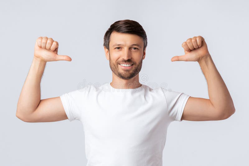Guy Pointing Thumbs at Himself on White, Studio Shot Stock Image ...