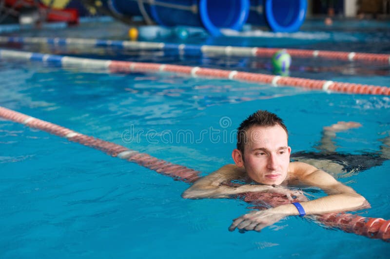 Guy in pool stock image. Image of athlete, competitive - 85500519