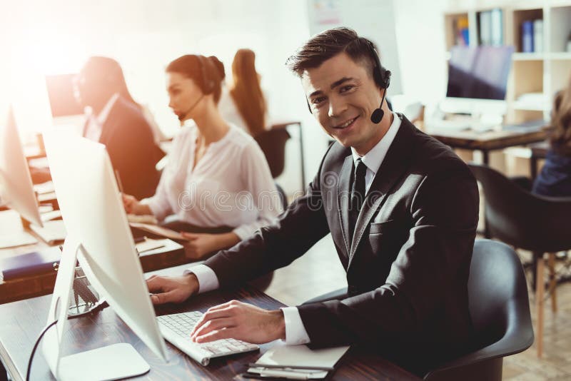 The Guy is Posing on the Camera in the Call Center. Stock Photo - Image ...